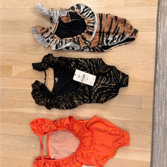 Molo | Swim | Molo Black And Gold Animal Print Swimsuit | Poshmark